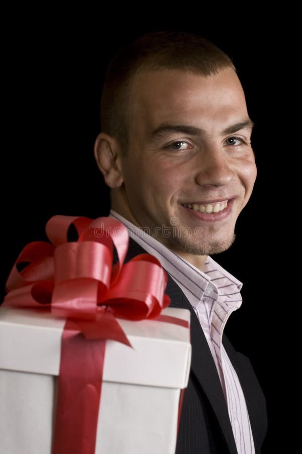 Man with a Wrapped Gift Box Stock Photo - Image of holding, color: 16965268