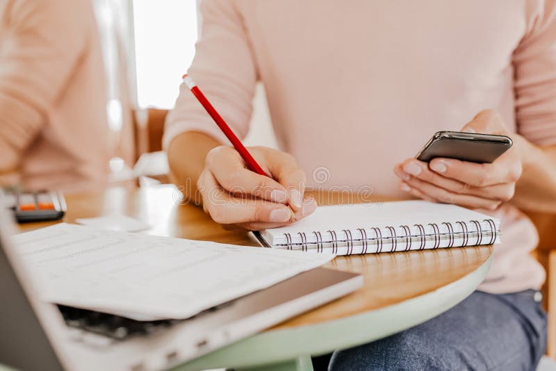 Man Writes Business Information in Notebook at Workplace in Office with ...