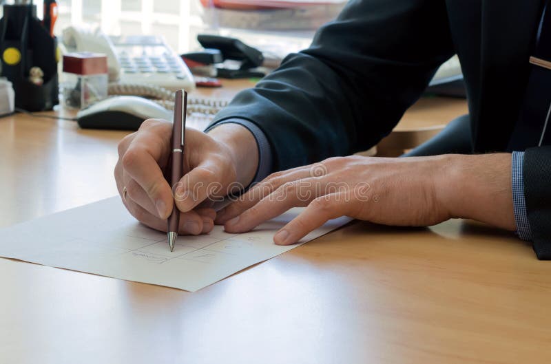 Close Shot of a Human Hand Writing Something on the Paper Stock Photo ...