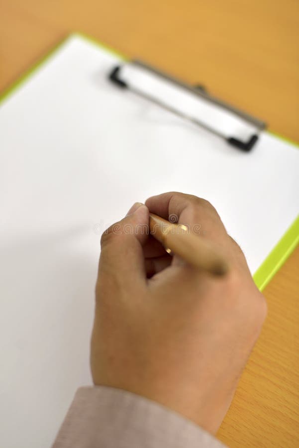 Man Writing on Blank Paper stock photo. Image of making - 44592742