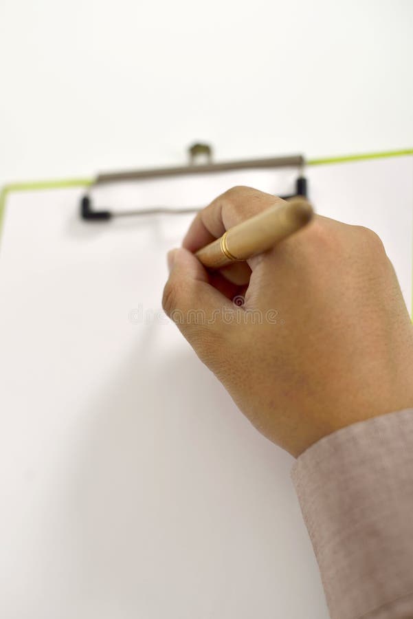 Man Writing on Blank Paper stock photo. Image of making - 44592742