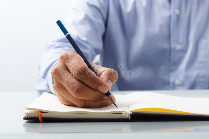 Man Writing In Journal With A Pencil Stock Image - Image of help ...