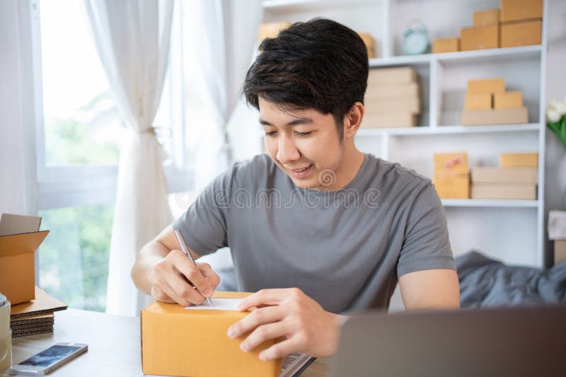 Man Writing Customer Details for Shipping in Home Office Stock Image ...