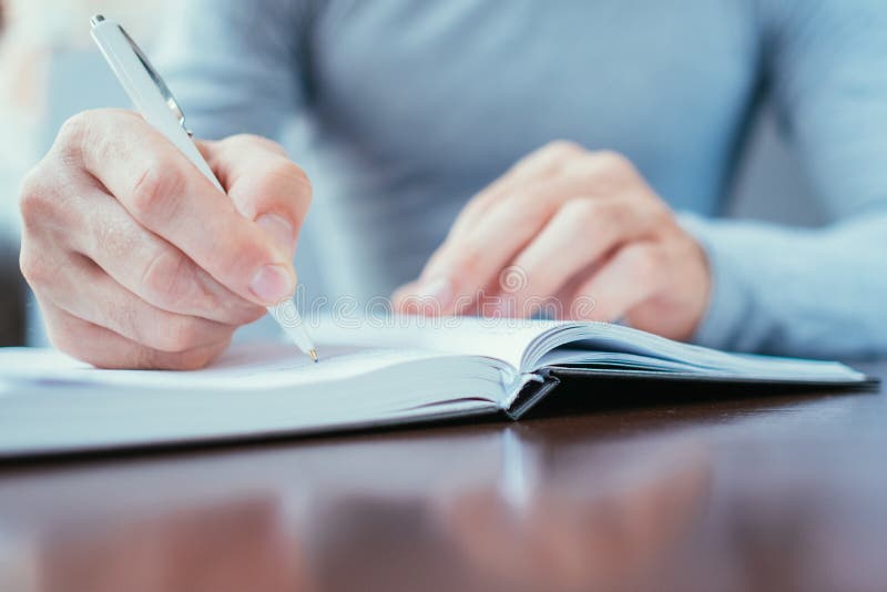 Man Writing Day Planner Work Schedule Organizer Stock Photo - Image of ...