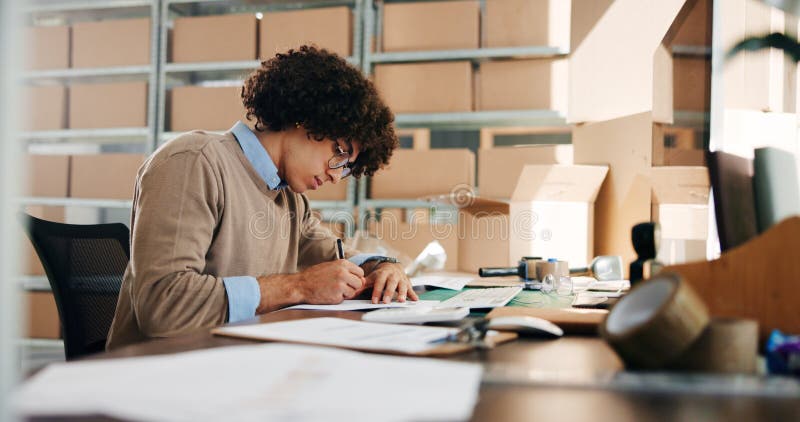 Man, Writing and Documents for Distribution in Warehouse, Inventory ...