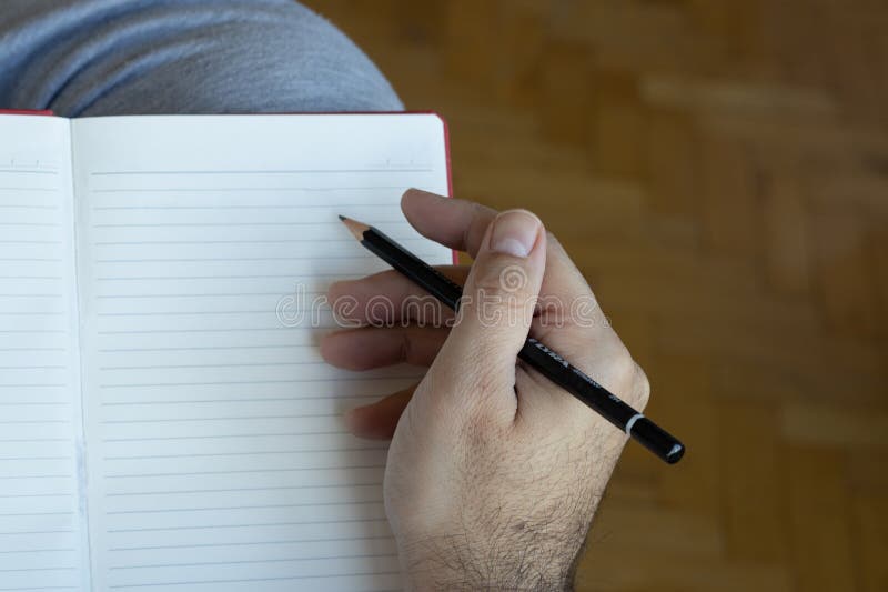 Man Writing or Drawing with Black Pen, Top View Stock Image - Image of ...