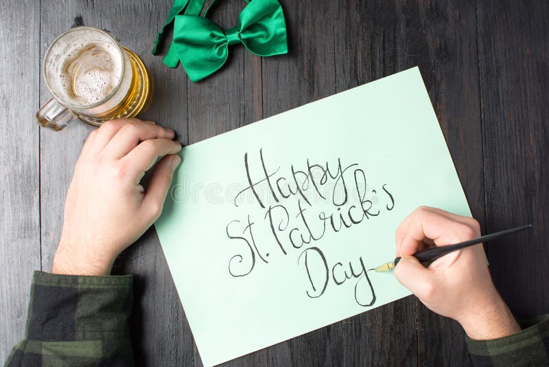Man Writing a Happy St Patrick Day Card Stock Image - Image of patricks ...