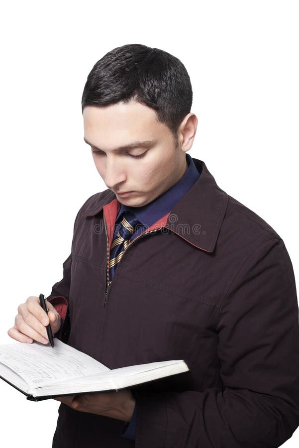 Man writing in his planner stock photo. Image of male - 19408198