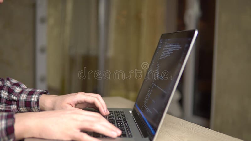 The Developer is Programming on the Laptop. Modern Workplace Stock Footage - Video of future ...