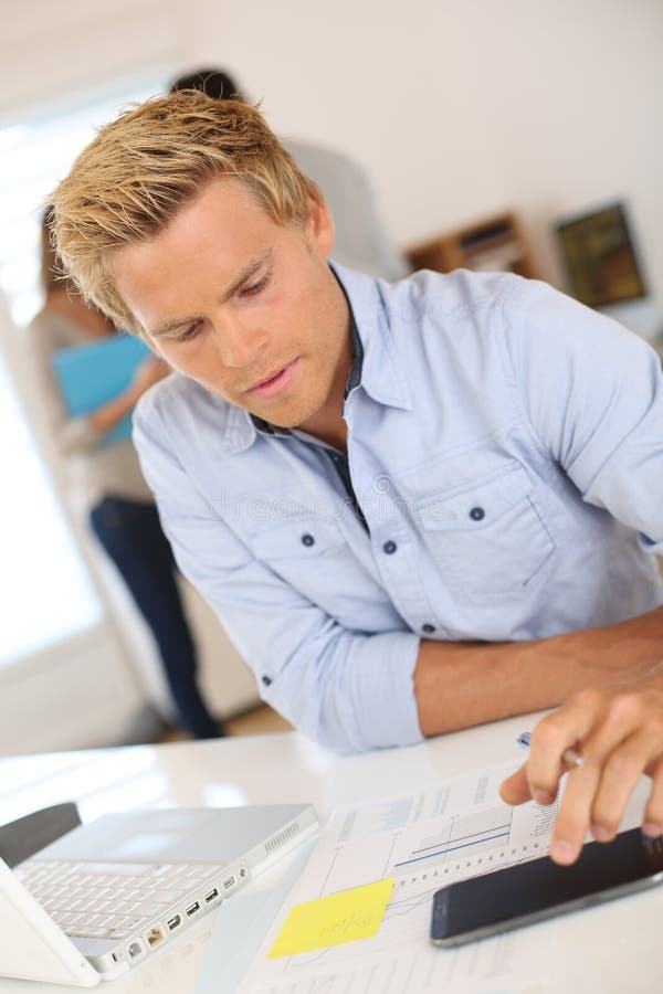 Man Writing Message on Smartphone from Office Stock Image - Image of ...