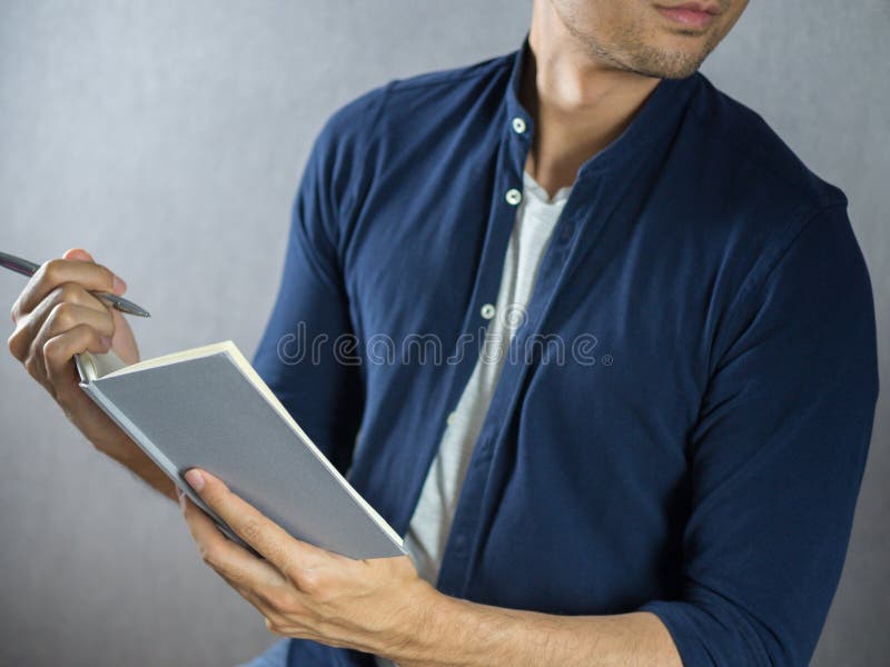 Man Writing on Note Book Close Up Stock Photo - Image of book, notebook ...