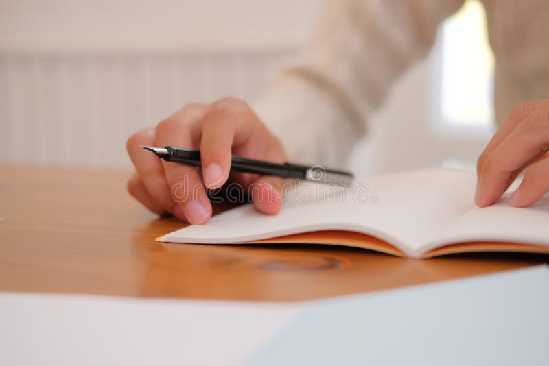 Man Writing Note on Notebook at Home Stock Photo - Image of student ...