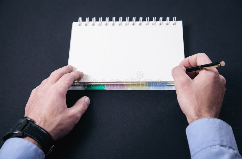 Man Writing on Notepad in Business Desk. Space for Your Text Stock ...