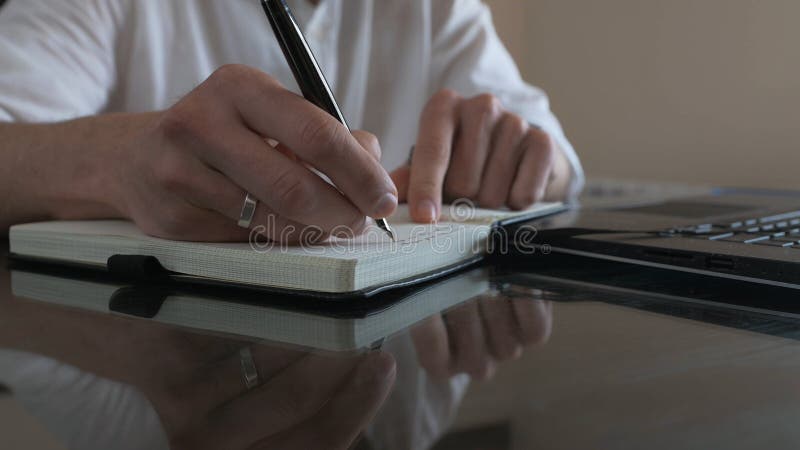 Man Writing Notes Desk Laptop Nearby Stock Photos - Free & Royalty-Free ...