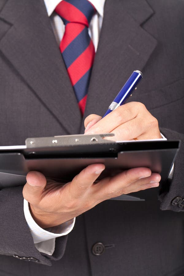 Man writing paper document stock photo. Image of hand - 21180224