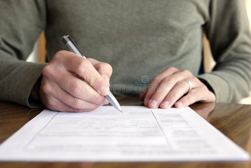 Man Writing on Paper with Pen on Table Stock Photo - Image of sign ...