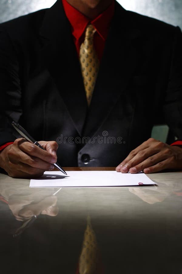 Man writing on a paper stock photo. Image of transaction - 46496116