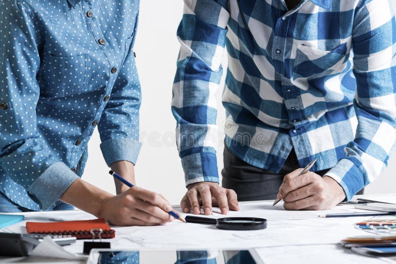 Man Writing with Pen on Technical Drawing Stock Photo - Image of ...