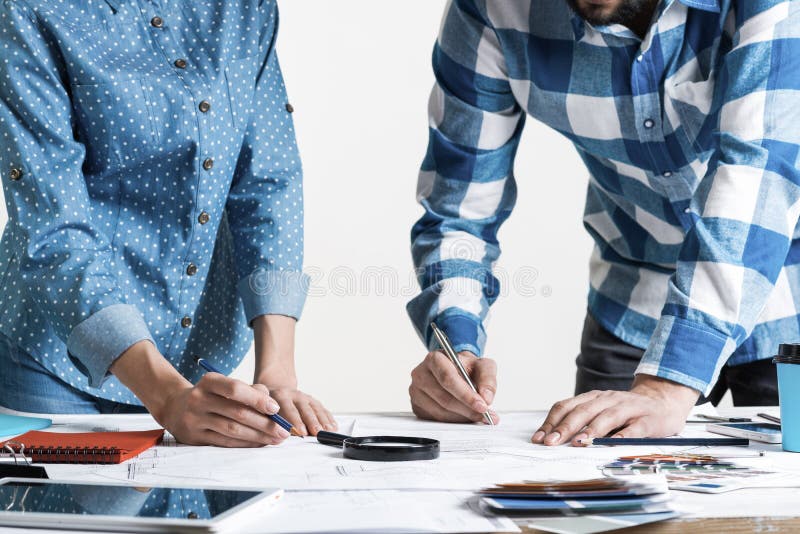 Man Writing with Pen on Technical Drawing Stock Photo - Image of ...