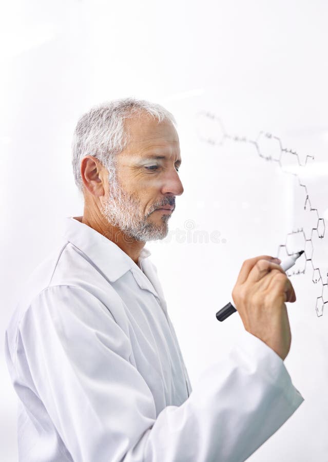 Man, Writing and Science by Glass Wall with Notes for Formula ...
