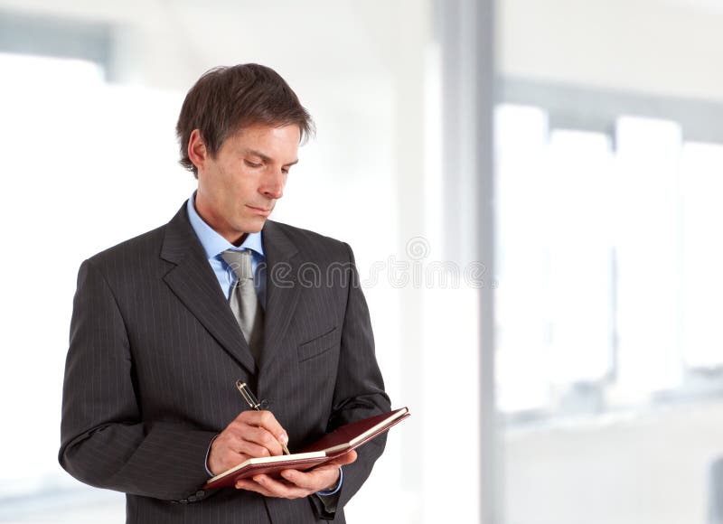 Man writing some notes stock image. Image of briefing - 18664717