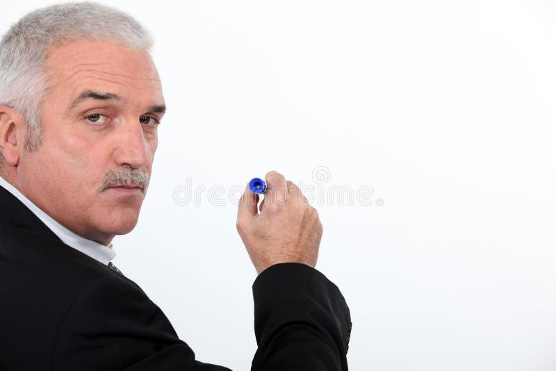 Man writing on white board stock photo. Image of standing - 23792758
