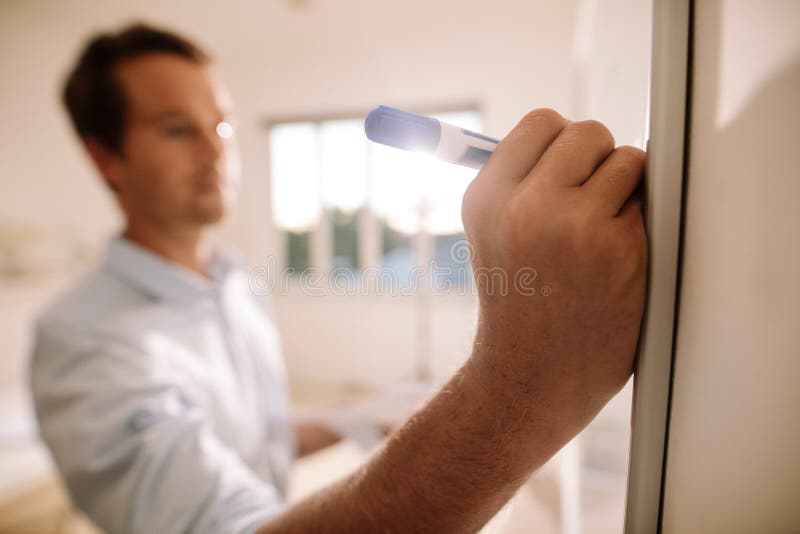 Man Writing on Whiteboard with Marker Pen Stock Photo - Image of ...