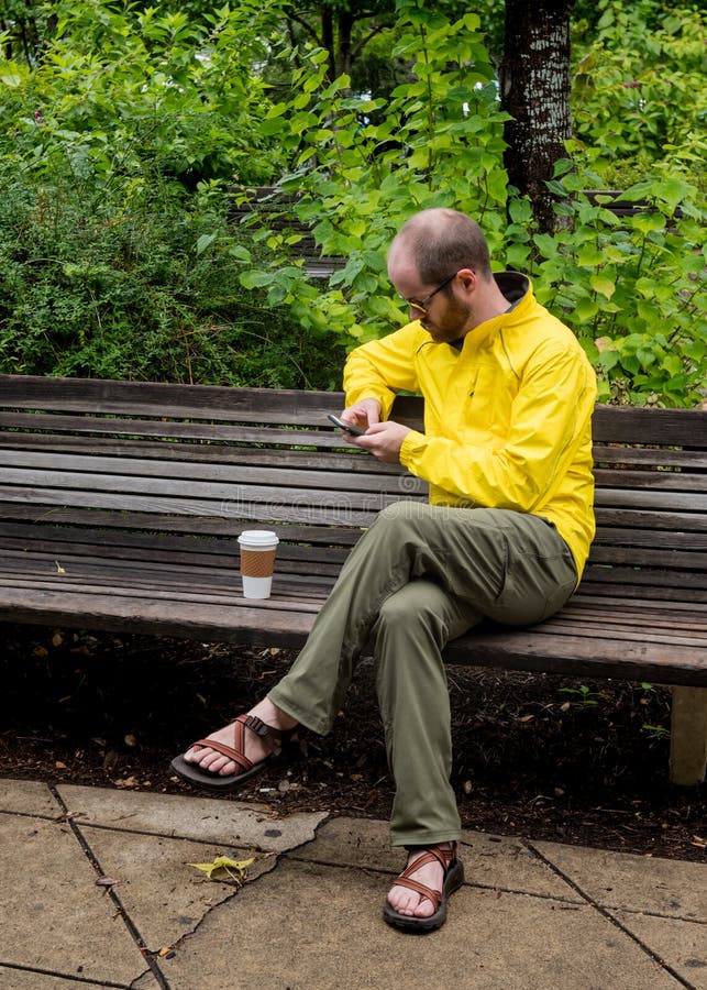 Man in Yellow Jacket Checking His Email Stock Photo - Image of hipster ...