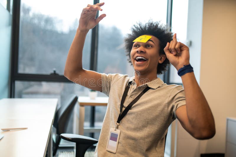 Man with Yellow Notes on Face Having Fun in Office Stock Image - Image ...