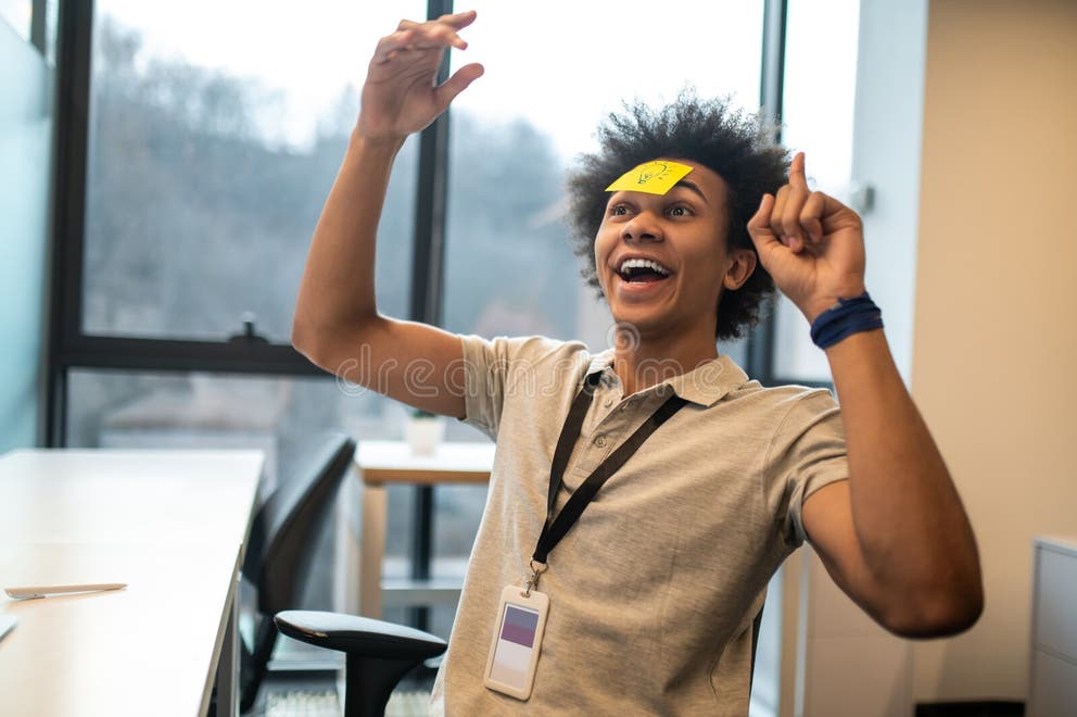 Man with Yellow Notes on Face Having Fun in Office Stock Image - Image ...