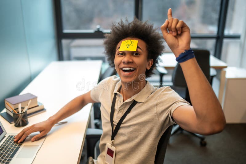 Man with Yellow Notes on Face Having Fun in Office Stock Photo - Image ...