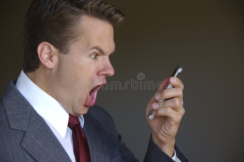 Man yells at cell phone stock photo. Image of cell, adviser - 12479048