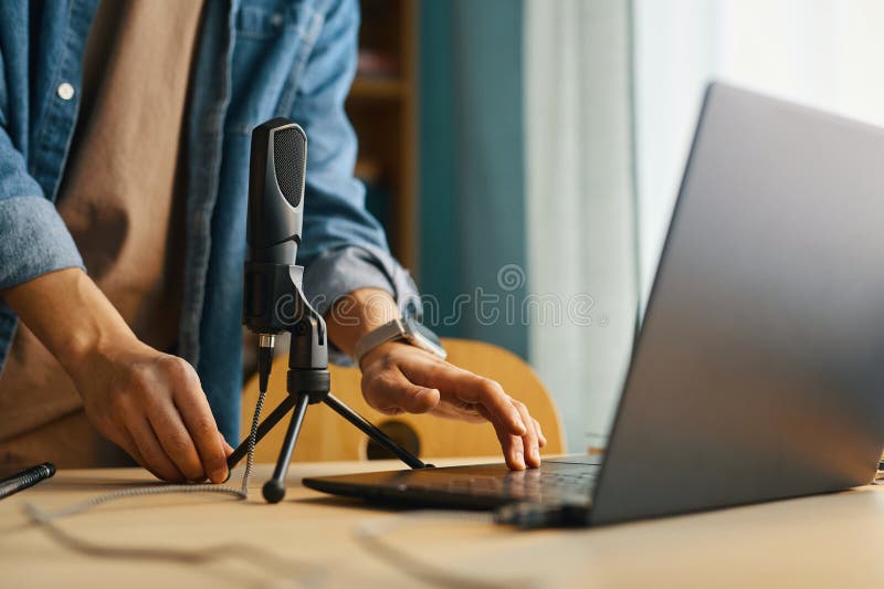 Adjusting Microphone and Laptop in Home Office Setting Stock Image ...