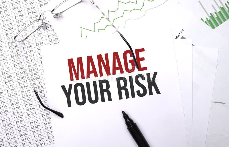 MANAGE YOUR RISK . Conceptual Background with Chart ,papers, Pen and ...