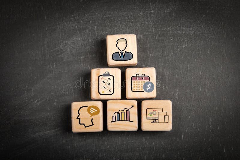 Management Concept. Wooden Blocks on a Black Chalkboard Background ...