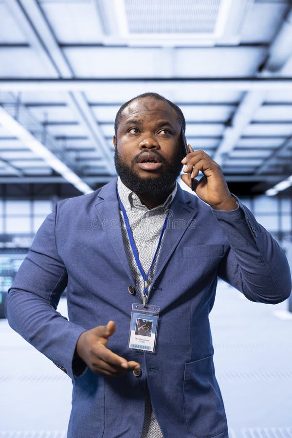 Management Executive Overseeing Operations in Cutting Edge Data Center ...