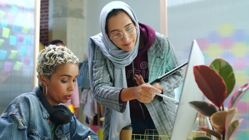 Management, Teamwork and a Women Helping with Report in Office ...