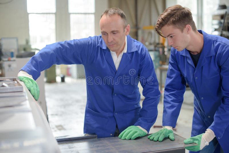 Manager and Apprentice in Factory Stock Photo - Image of safety ...