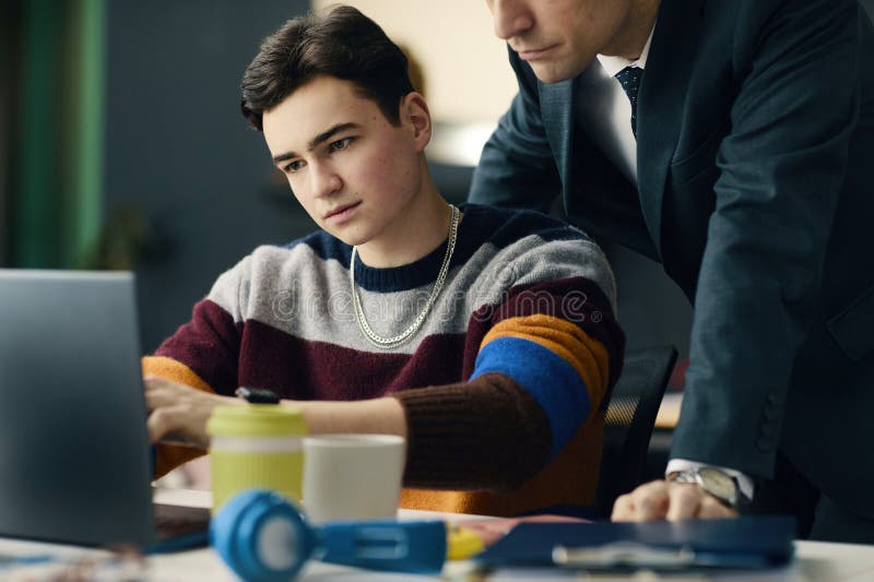 Manager Asking Advice at His Colleague during Work Stock Photo - Image ...