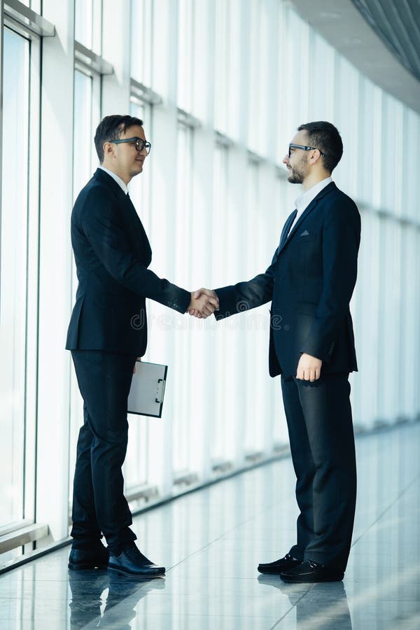Manager and boss handshake stock image. Image of consulting - 83643315
