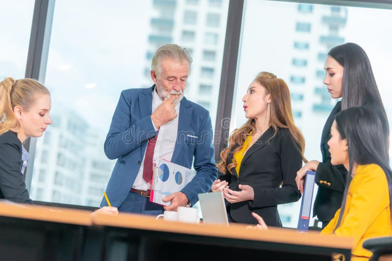 Senior Manager Boss Helping and Teaching His Female Officer in Office ...