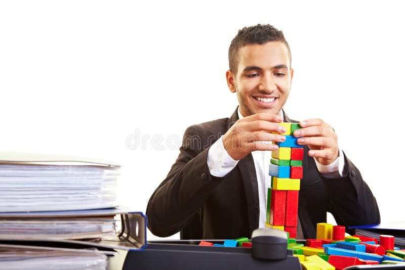Manager building a tower stock image. Image of colorful - 12966913