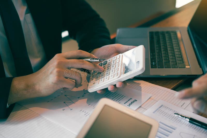 Manager Calculates about the Company Finances by Pressing on the ...