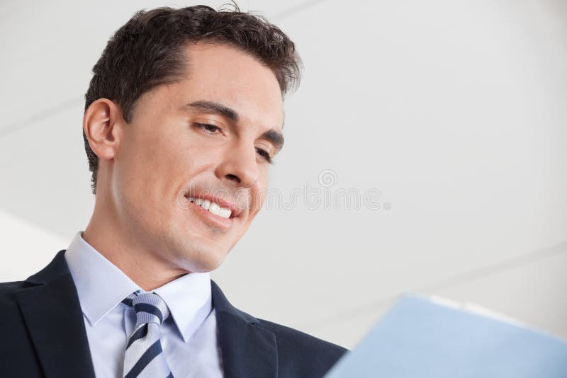 Senior Manager Reading at His Desk Stock Photo - Image of ...