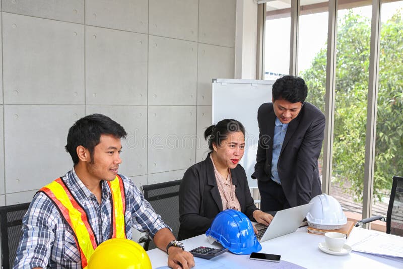 Team Work Concept. Engineering Team Work Together Stock Photo - Image ...