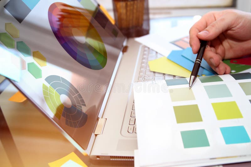 Manager is Choosing a Color on a Laptop for Design Project Stock Photo ...
