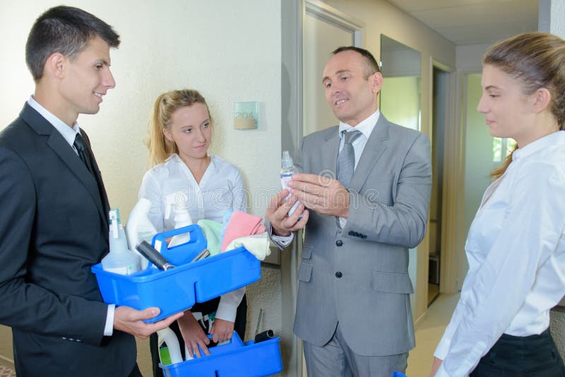 Manager with Cleaner Apprentices Stock Photo - Image of cleaner, human ...