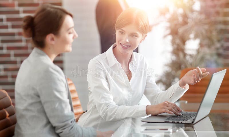 Manager and Client Discuss the Information Received with the Lap Stock ...