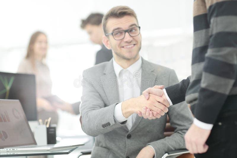 Manager and the Client Shake Hands when Meeting in the Office Stock ...