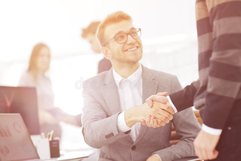 Manager and the Client Shake Hands when Meeting in the Office Stock ...
